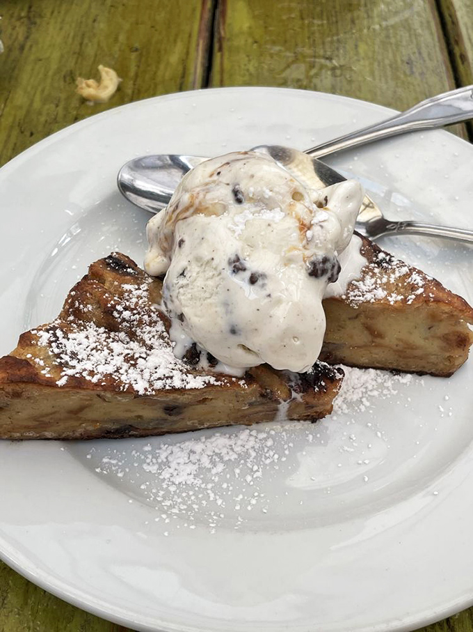 This isn't just dessert—it's bread pudding elevated to an art form, crowned with ice cream that melts into all the right places.