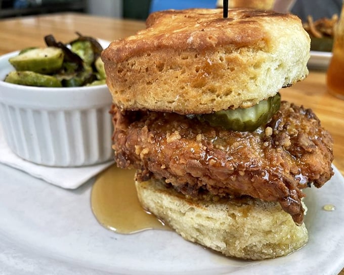 The Bumblebee biscuit sandwich with honey drizzle—where sweet meets savory in a relationship that makes Romeo and Juliet look casual.
