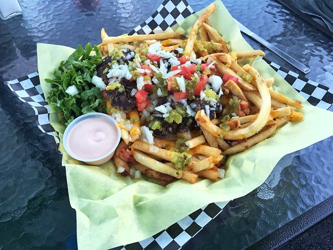 These loaded fries aren't just a side – they're a main event featuring crispy potatoes as the stage for a carnival of toppings.