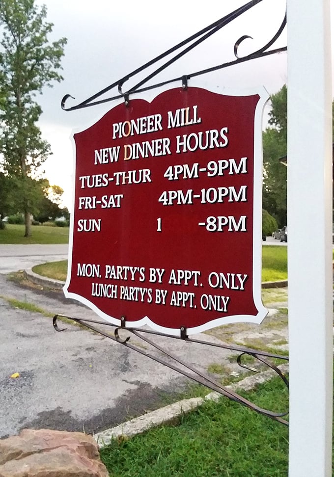 The hours sign stands as a beacon of hope for hungry travelers – plan accordingly or face the disappointment of closed doors.