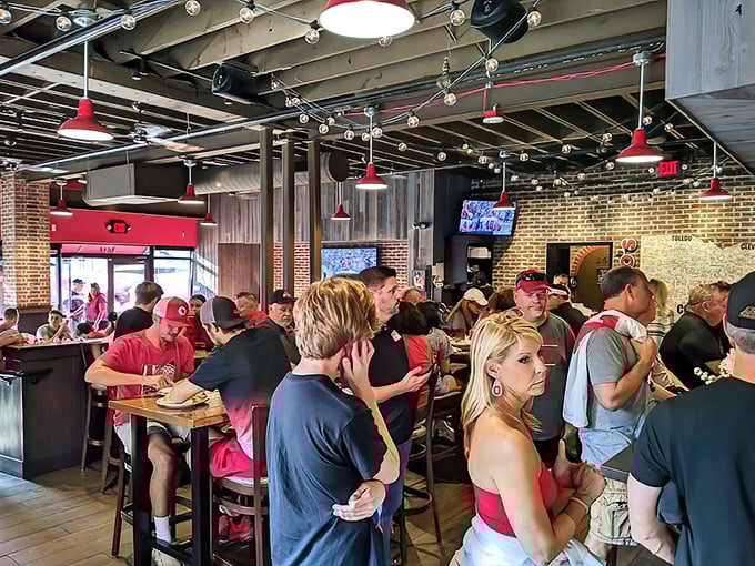 Game day at Adriatico's isn't just busy – it's a scarlet and gray symphony of hungry fans fueling up for victory or consoling defeat.
