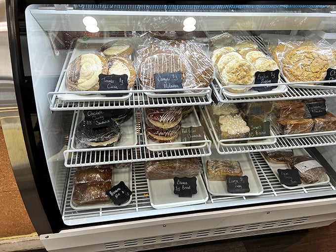 The pastry case—where willpower goes to die and "I'll just have a coffee" turns into "and one of each, please."