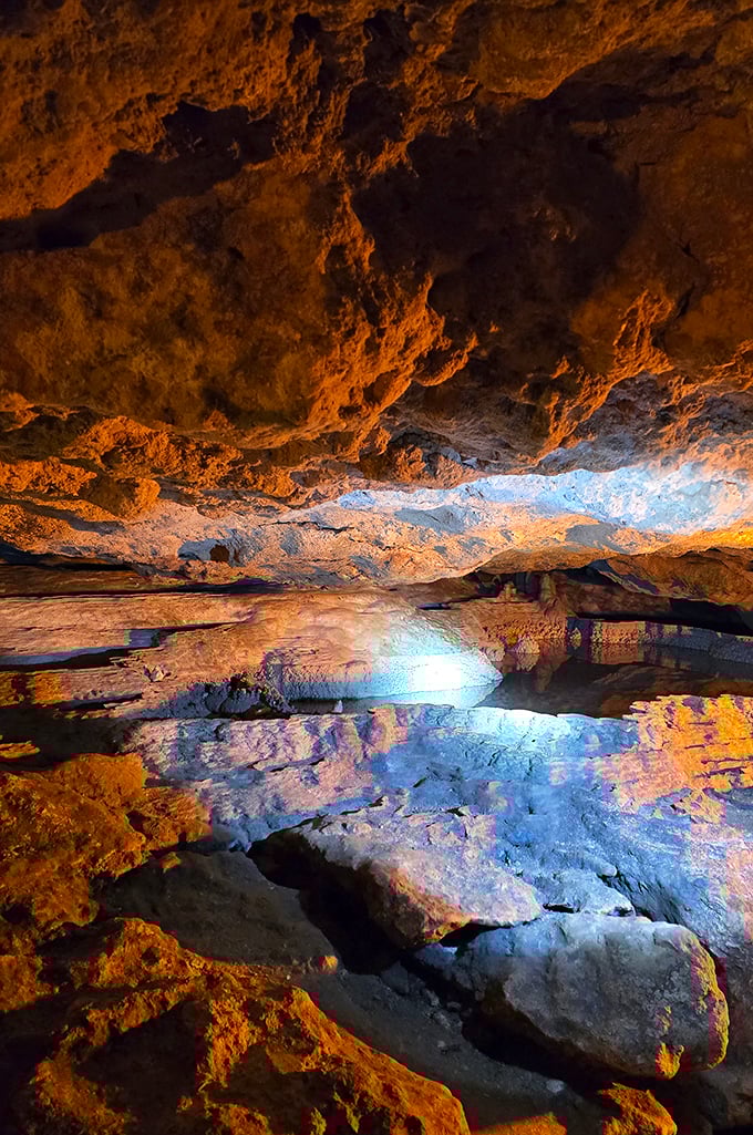 Mirror, mirror on the floor—this reflective pool creates a double vision of the cavern's spectacular ceiling, doubling the wonder.