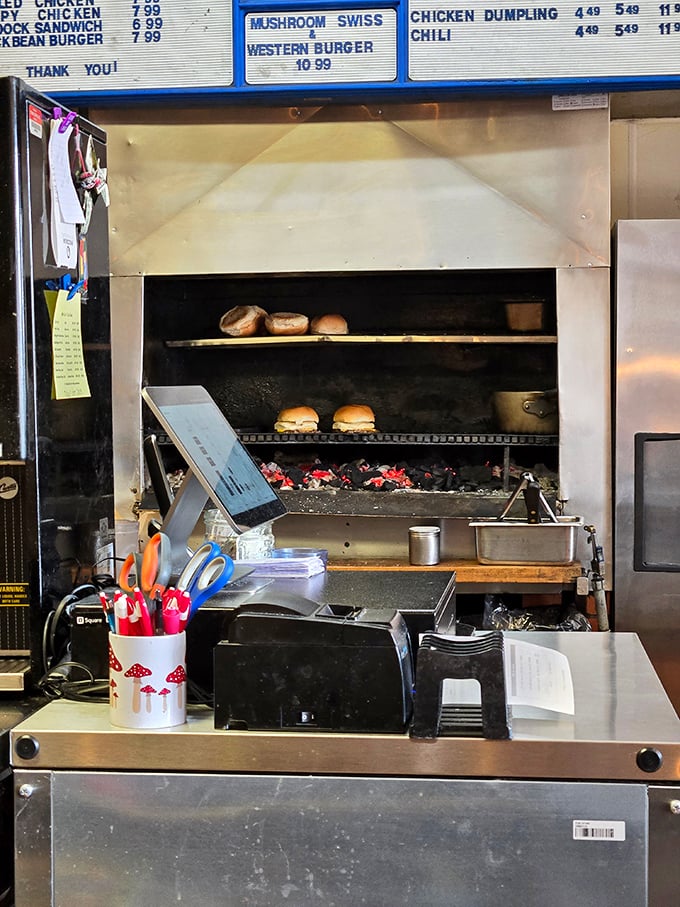 Behold the sacred flames—real charcoal imparting that distinctive smoky flavor that no gas grill could ever hope to duplicate.