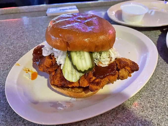 This chicken sandwich isn't trying to start a Twitter war—it's too busy being delicious with its perfectly crisp coating and fresh toppings.