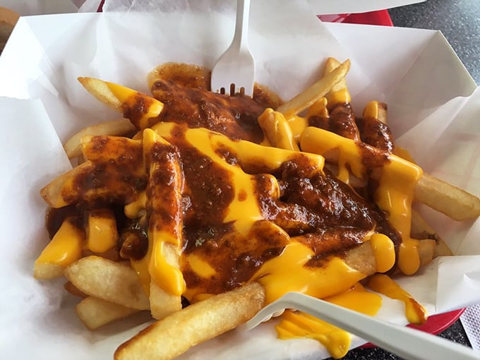 Chili cheese fries that require both a fork and a moment of silent appreciation – a glorious mess that's worth every napkin you'll need afterward.
