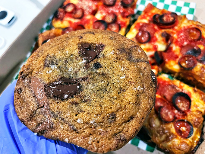 Their chocolate chip cookie poses with pizza in the background like a celebrity photobombing your vacation pictures—both equally worthy of your attention.