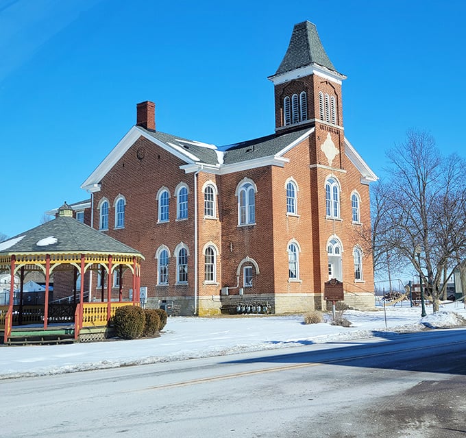 The stately Clifton Union School building reaches skyward with its distinctive tower, a brick testament to the town's commitment to education.
