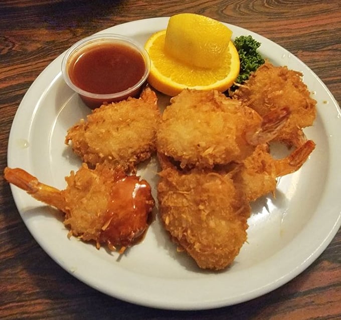These coconut shrimp aren't just fried—they're transformed into crispy-sweet treasures that would make any island proud.