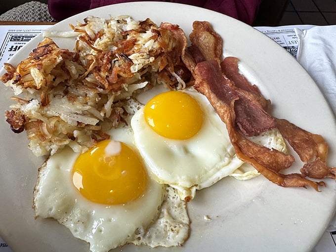 Eggs sunny-side up with a smile. This breakfast plate has probably solved more of life's problems than any self-help book.