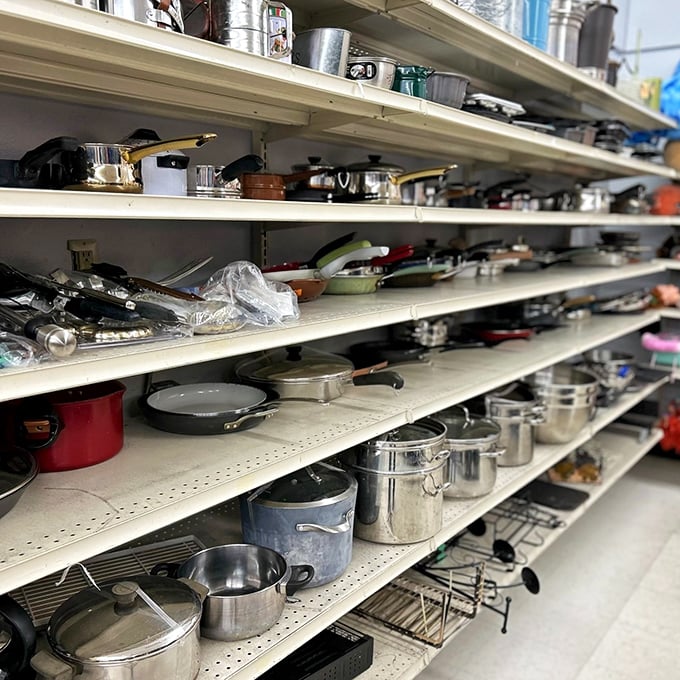 The cookware aisle – where professional-grade pots mingle with vintage casserole dishes, all waiting to elevate your kitchen game.