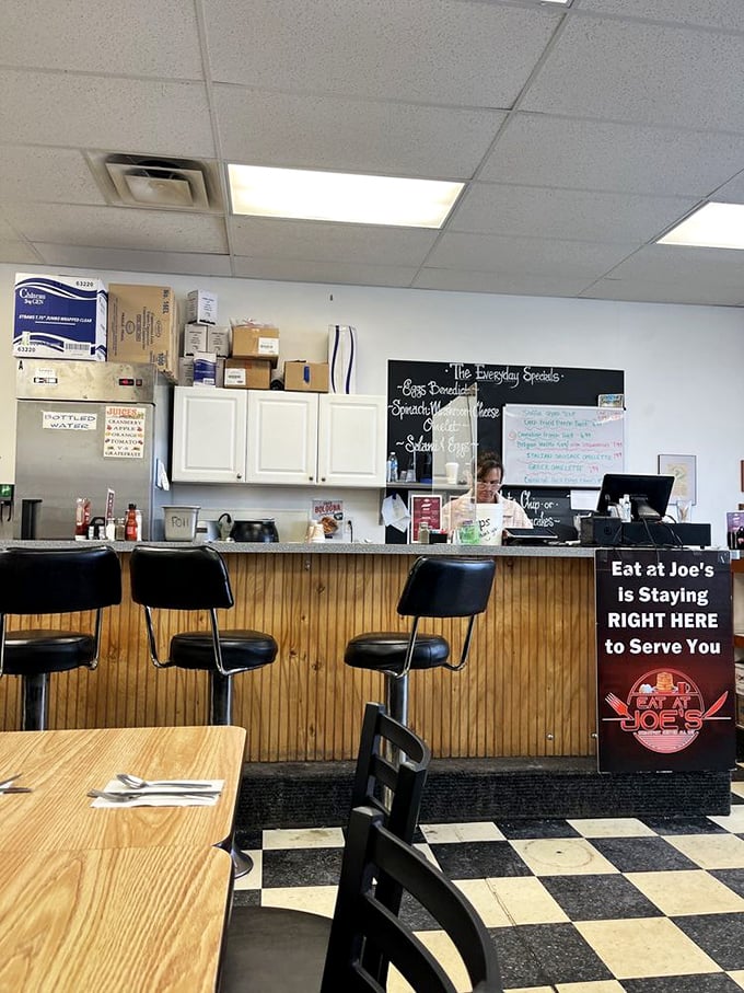 The counter offers front-row seats to watch breakfast magic unfold in this bustling kitchen theater.