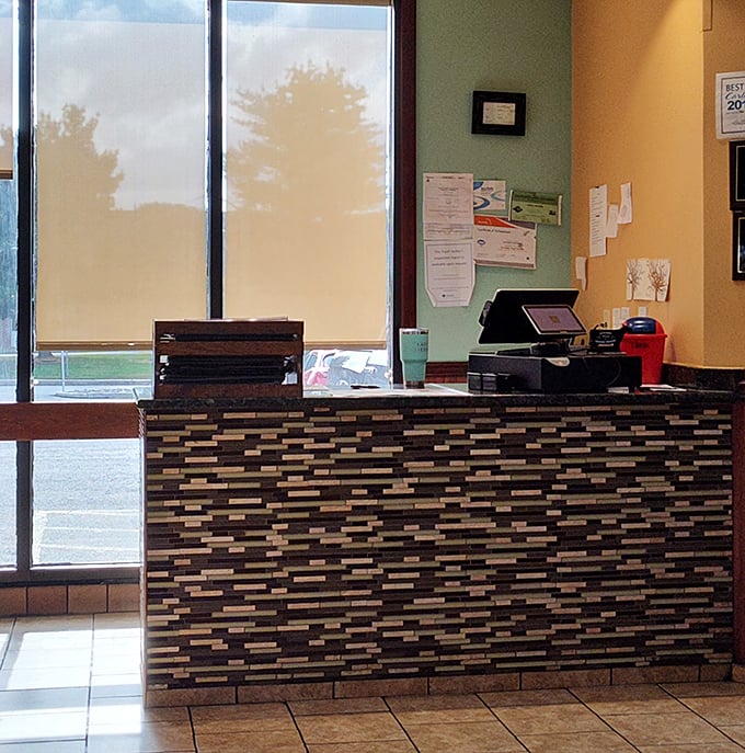 The host station—first point of contact in this temple of comfort food. Where "Table for two?" begins adventures in Pennsylvania dining.