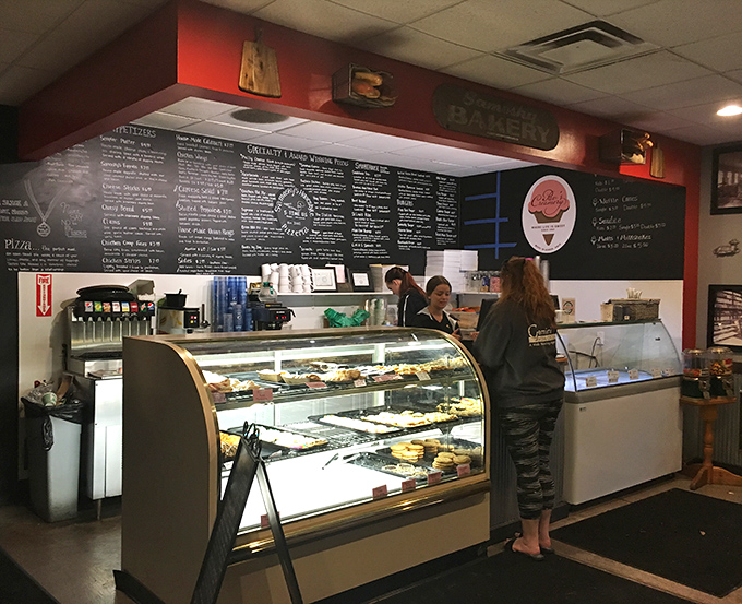 Sweet temptations behind glass—because sometimes you need dessert before, after, and possibly during your pizza experience.