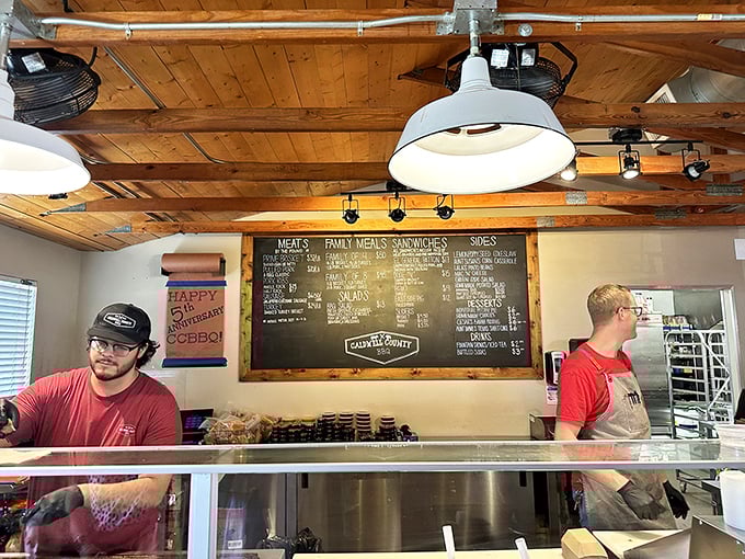 The counter where dreams come true. Those staff members aren't just servers—they're gatekeepers to a realm of smoky deliciousness.