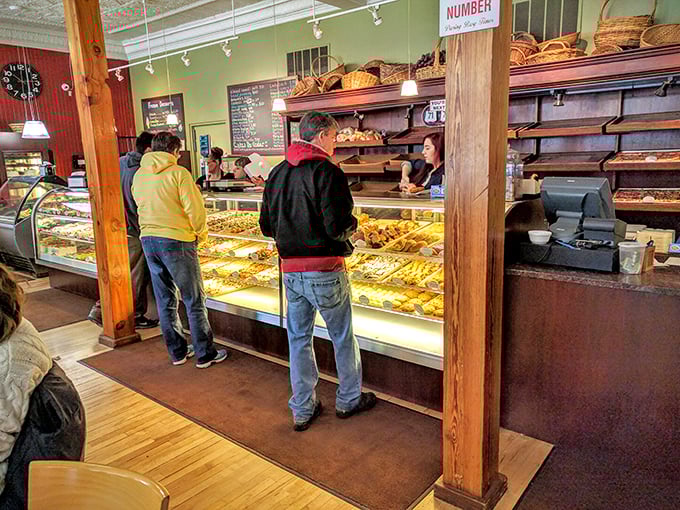 The moment of anticipation – customers contemplating which delicacy will make the journey home. Some decisions are deliciously difficult.