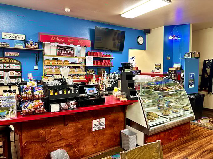 The counter area showcases freshly baked goods that silently judge you for even considering ordering "just coffee."
