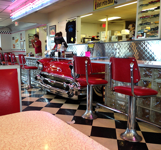 The counter area features actual car parts transformed into seating, proving that in America, our love affair with automobiles extends right into our dining experiences.