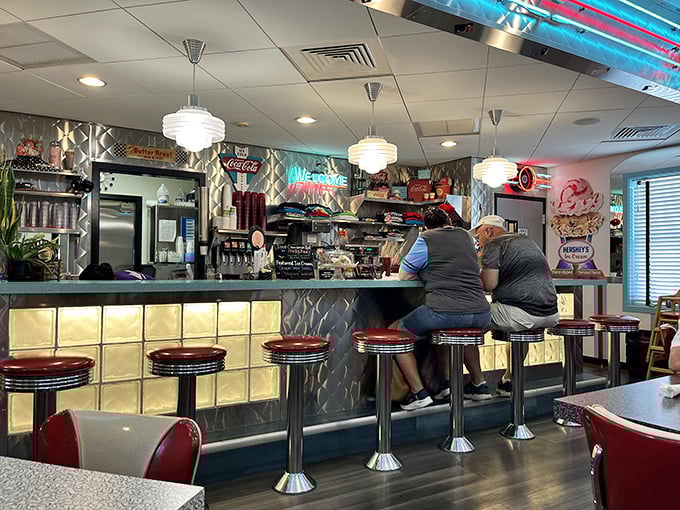 Counter seating—the best seats in the house for watching short-order magic happen while perched on those classic swivel stools.