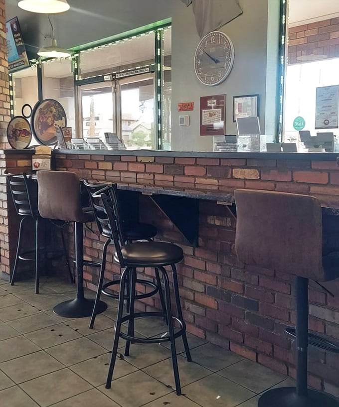 Counter seating with a view—perfect for solo diners who want to watch the sandwich artistry unfold while contemplating life's important questions, like "soup or chips?"