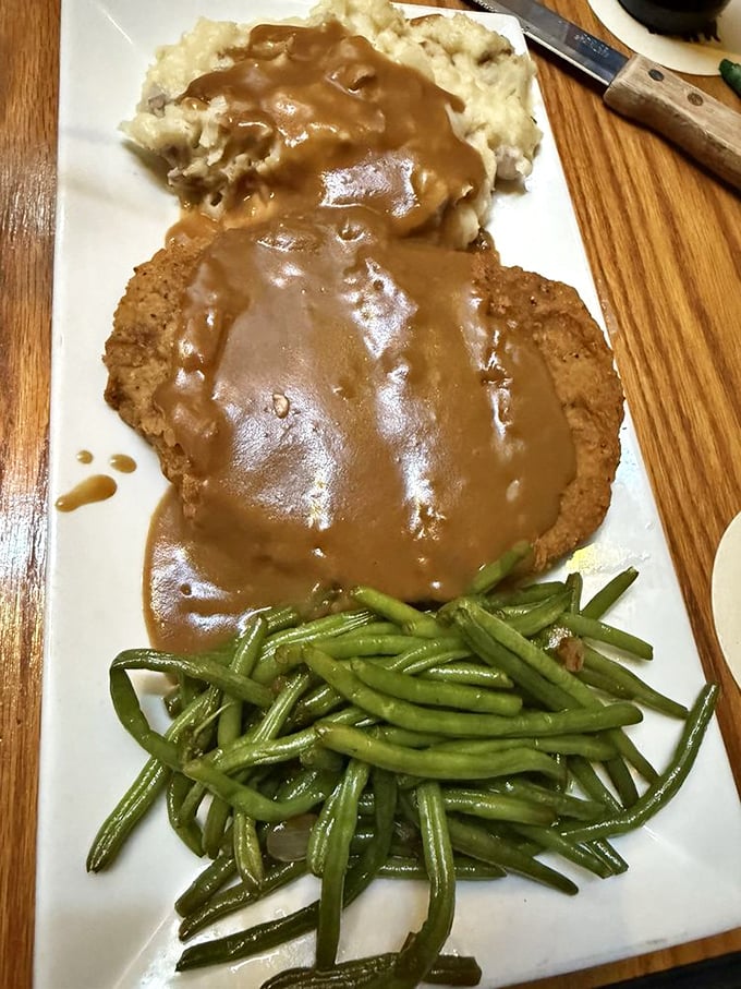 Country fried steak smothered in gravy so good you'll want to write home about it—comfort food that crosses all state lines.