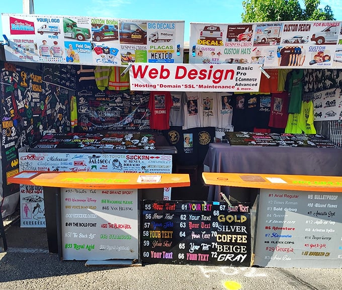 This booth offers one-stop shopping for your digital and physical identity—web design with a side of custom t-shirts is peak 21st century flea market.