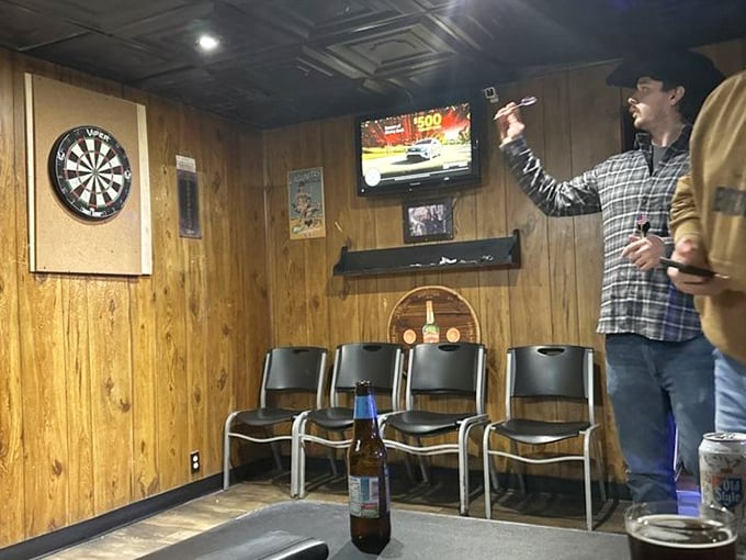 The dart board corner – where friendly competitions have been settling debates and entertaining patrons for years over cold bottles and hot pizza.