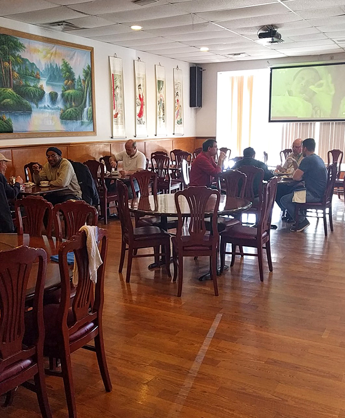 Real people enjoying real food – the kind of scene that makes any restaurant worth visiting.