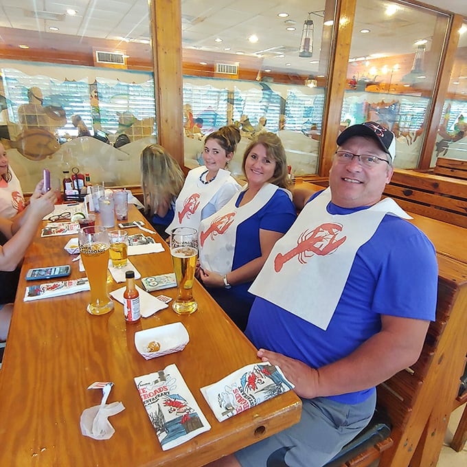Dining with a view of fellow seafood enthusiasts. Those lobster bibs aren't just practical—they're the unofficial uniform of serious eaters.