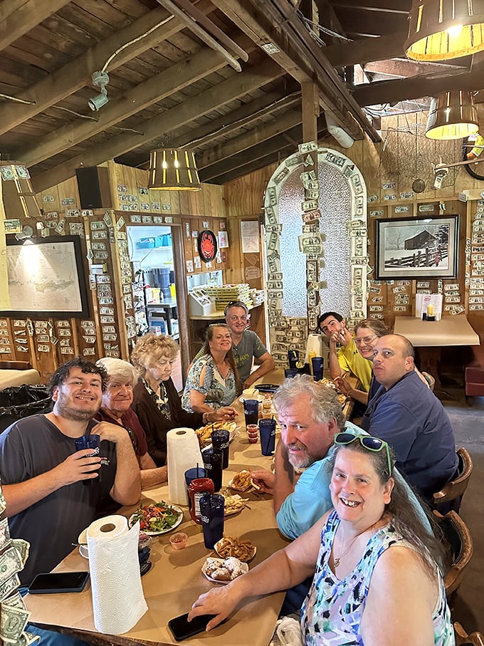 A table of happy diners proving that the best seasoning for any meal is good company and the anticipation of something delicious.