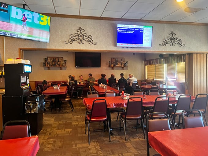 Red tablecloths and multiple TVs – the universal signal that you've found a place where both serious eating and serious sports-watching are respected equally.