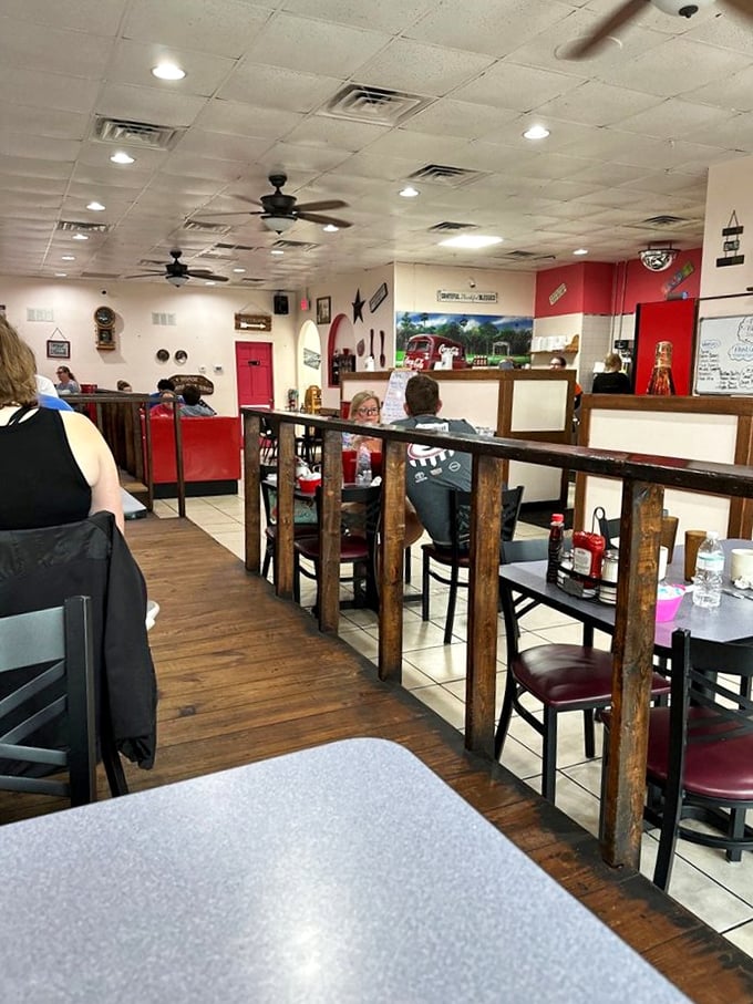 The dining room buzzes with the happy sounds of folks who've discovered one of Port Canaveral's best-kept secrets. Those wooden dividers aren't just for show—they're conversation starters.