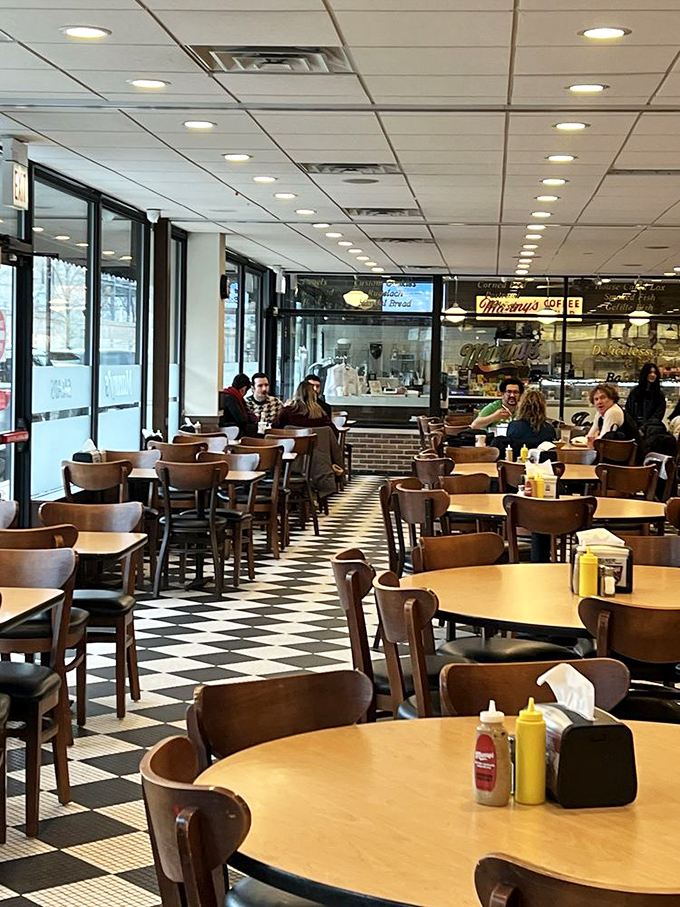 Where strangers become friends over mustard-slathered sandwiches and the shared language of "mmm" and "wow."