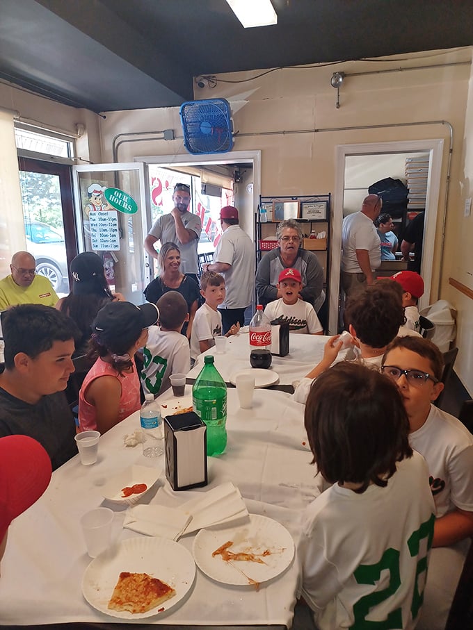 Where local teams celebrate victories and families create memories—all fueled by exceptional pizza in an unpretentious setting.
