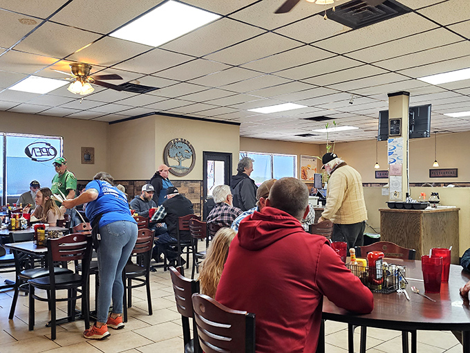 The dining area hums with conversation and the gentle clink of forks against plates – the soundtrack of small-town America.