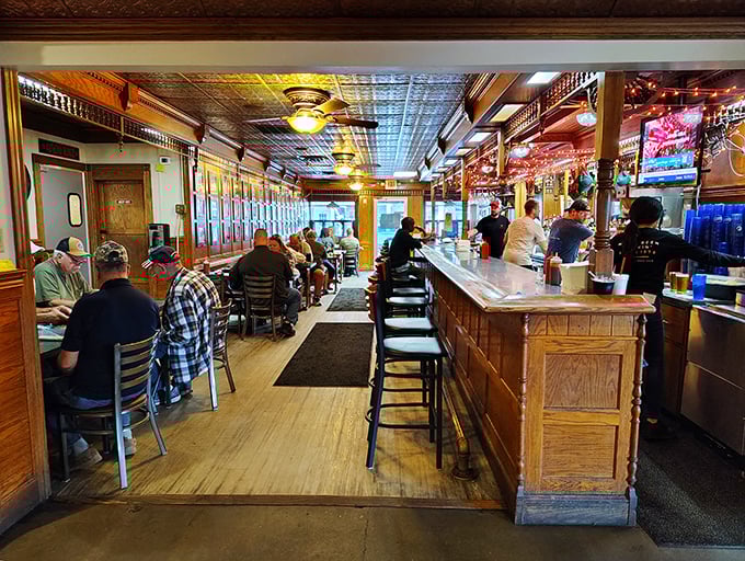 The bar area buzzes with locals who've made the Ribber their second living room—a place where everybody might not know your name, but they respect your appetite.