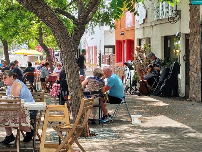 Outdoor dining where the neighborhood provides the entertainment. Musicians, sunshine, and breakfast – the holy trinity of a perfect San Diego morning.
