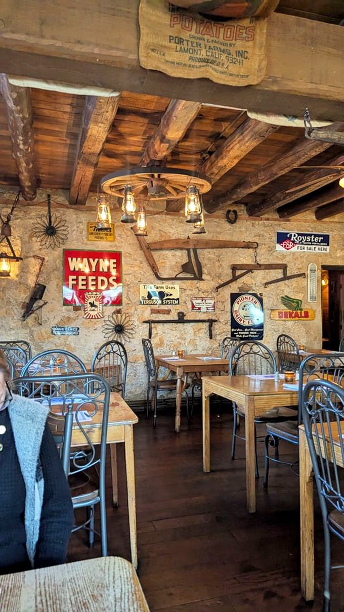 Vintage farm implements and weathered signs aren't decoration—they're silent witnesses to generations of Wisconsin agricultural heritage and really good meals.
