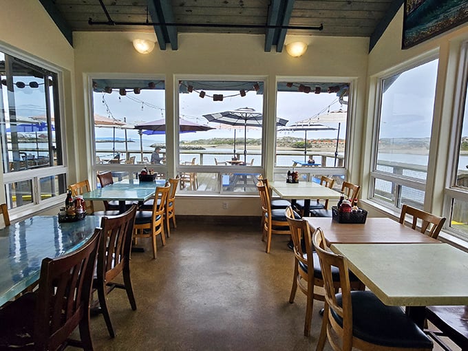 Windows that frame the harbor view like living paintings—nature's artwork complementing every bite you take.