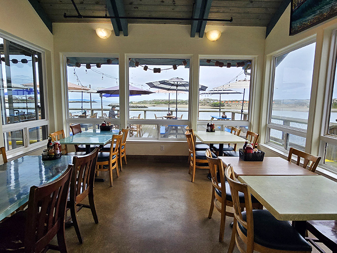 Windows that frame the harbor view like living paintings—nature's artwork complementing every bite you take.