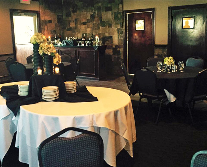 The private dining area transforms ordinary occasions into memorable celebrations with its stone walls and elegant simplicity.