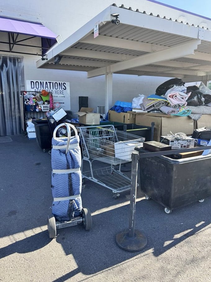 The donation drop-off area: where yesterday's impulse purchases become tomorrow's treasures. The circle of retail life continues uninterrupted.