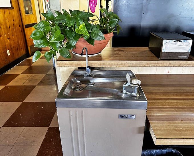 Even the water fountain feels charmingly vintage—a humble reminder that the simplest things often bring the most satisfaction.