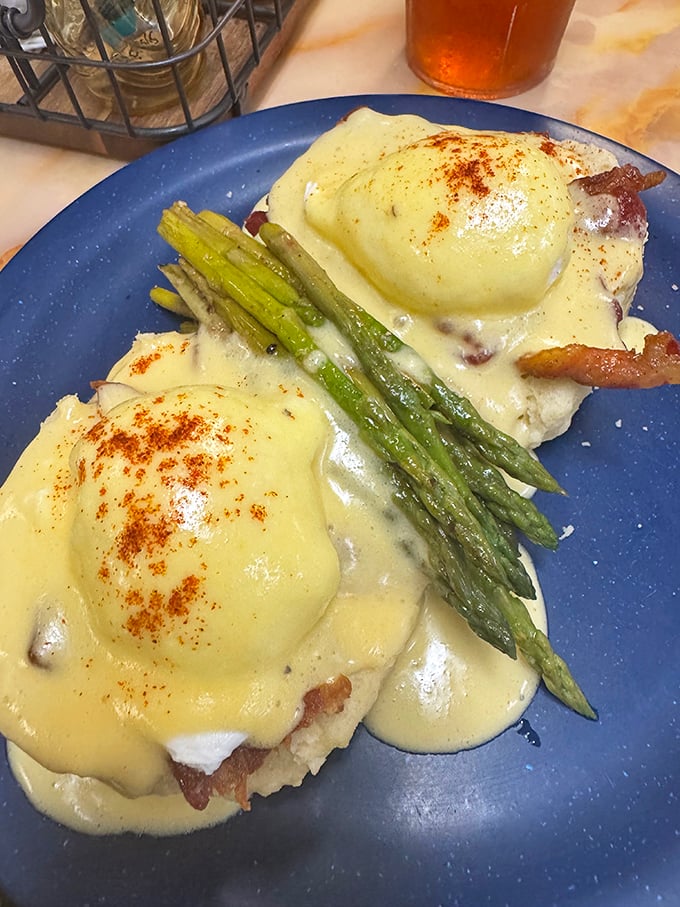 Their eggs Benedict redefines decadence—perfectly poached eggs draped in hollandaise with asparagus adding a touch of virtue to the indulgence.