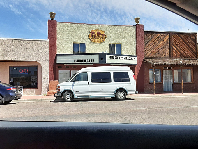 The historic El Rio Theatre's marquee announces "Girl Believe Miracles," though the real miracle might be finding a classic single-screen cinema still thriving today.