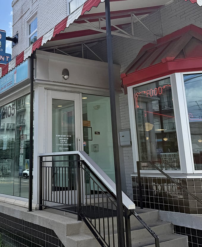 The entrance to happiness is surprisingly simple—just a door, some steps, and the promise of comfort food waiting on the other side.