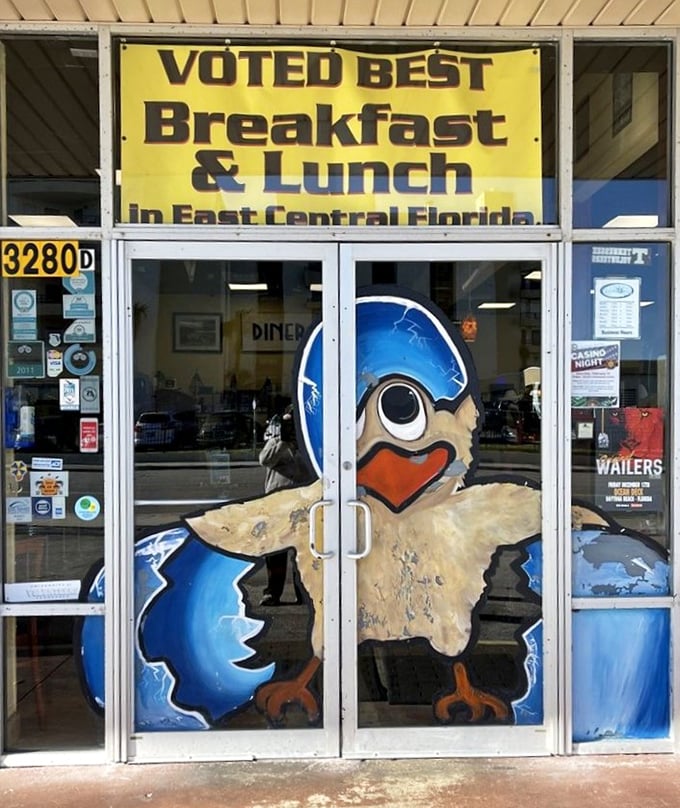 The entrance that separates the hungry from the happy. That cartoon chicken knows what awaits inside.