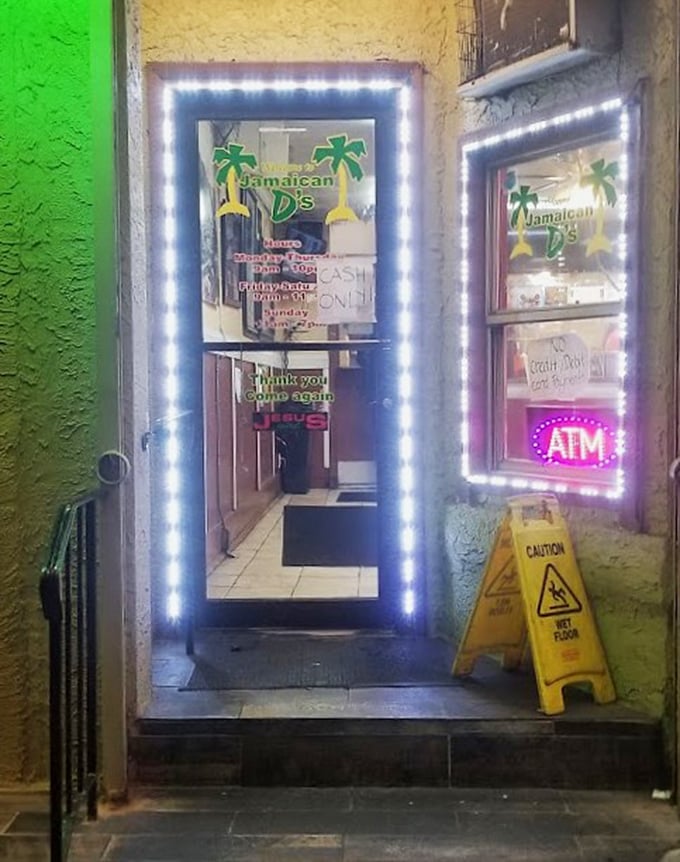 The entrance glows like a beacon of culinary hope. Those LED lights aren't just decoration—they're guiding hungry souls to Caribbean bliss.