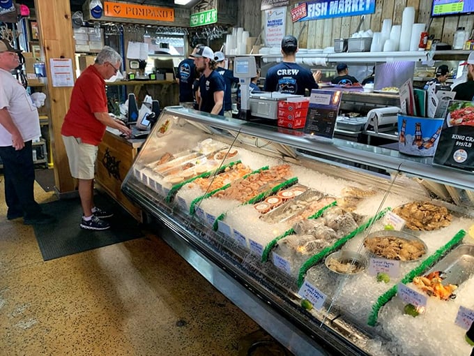 The fish market display case – where tomorrow's Instagram food photos begin their journey. From Gulf to plate in record time.