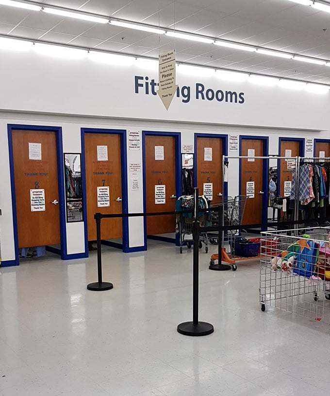 The fitting room corridor stands ready for fashion experiments and honest mirror moments—where thrift store gambles become wardrobe winners.